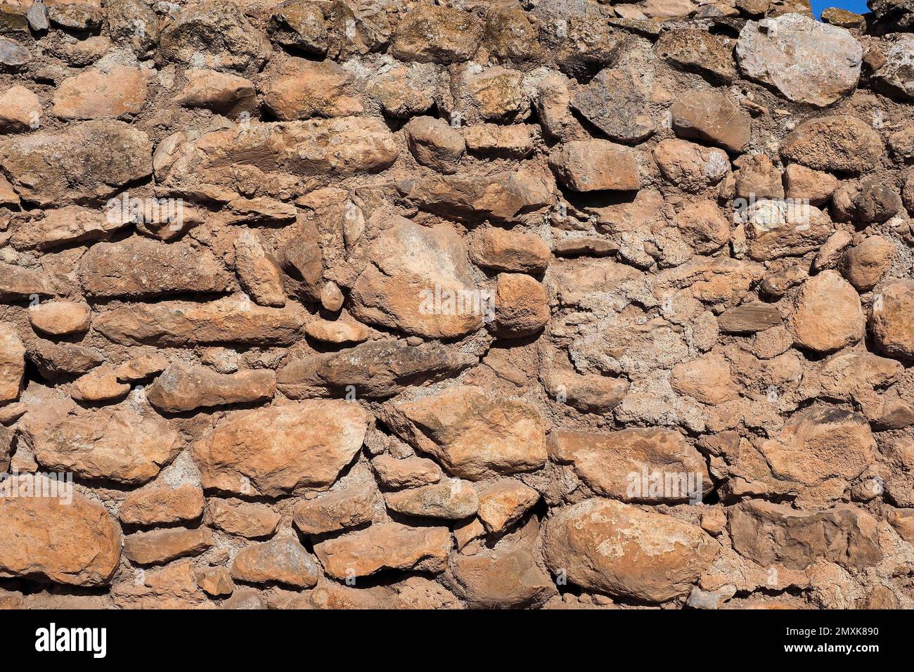 Wall of natural stones, house wall with field stones, Andalusia, Spain ...