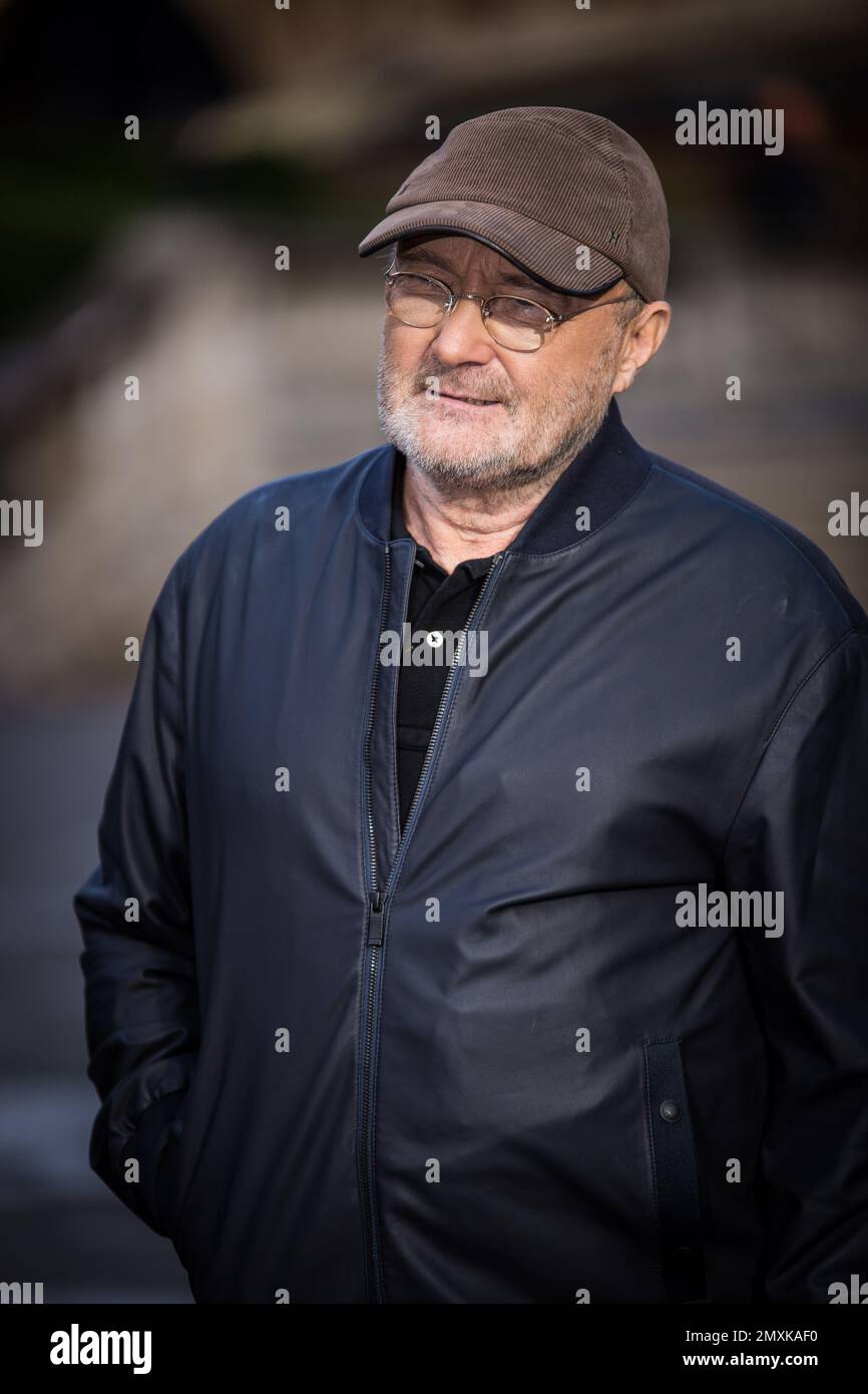 Singer Phil Collins poses for photographers during a photo call to ...