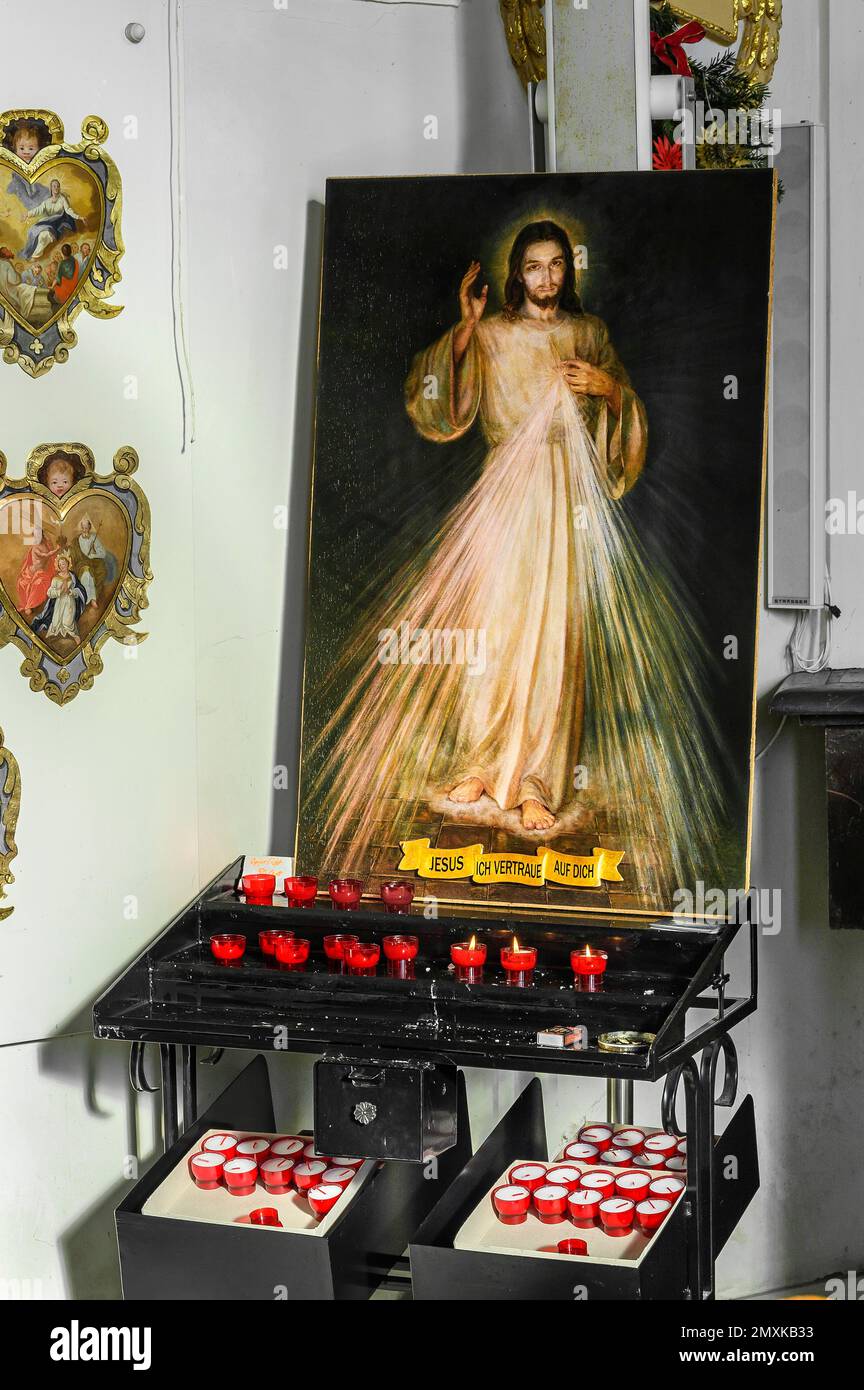 Image of Jesus with sacrificial candles, St. Magnus Church in ...