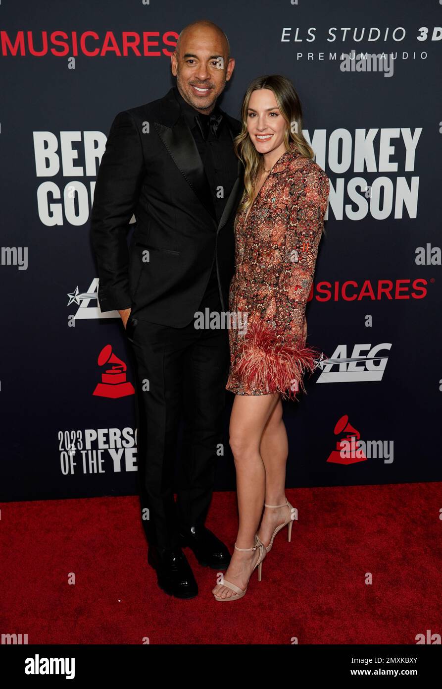 CEO of the Recording Academy, Harvey Mason Jr., left, and Britt Burton ...