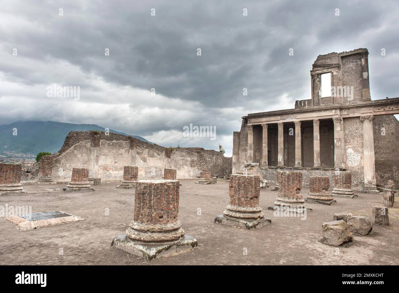 Archaeology, base of columns of basilica, ancient Roman city of Pompeii ...