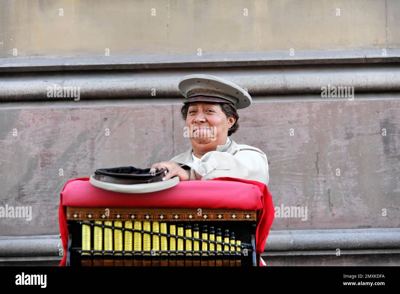 Roller organ, woman standing behind it, Plaza Zocalo and National ...