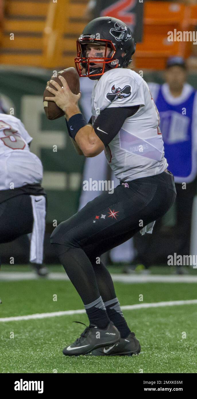 UNLV quarterback Dalton Sneed looks to pass the football in the first ...