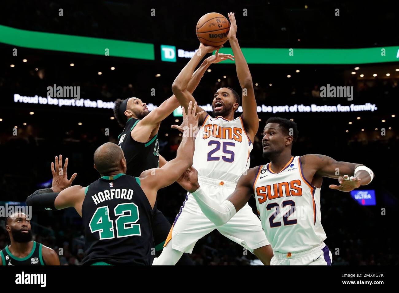 Phoenix Suns' Mikal Bridges (25) shoots against Boston Celtics' Derrick ...