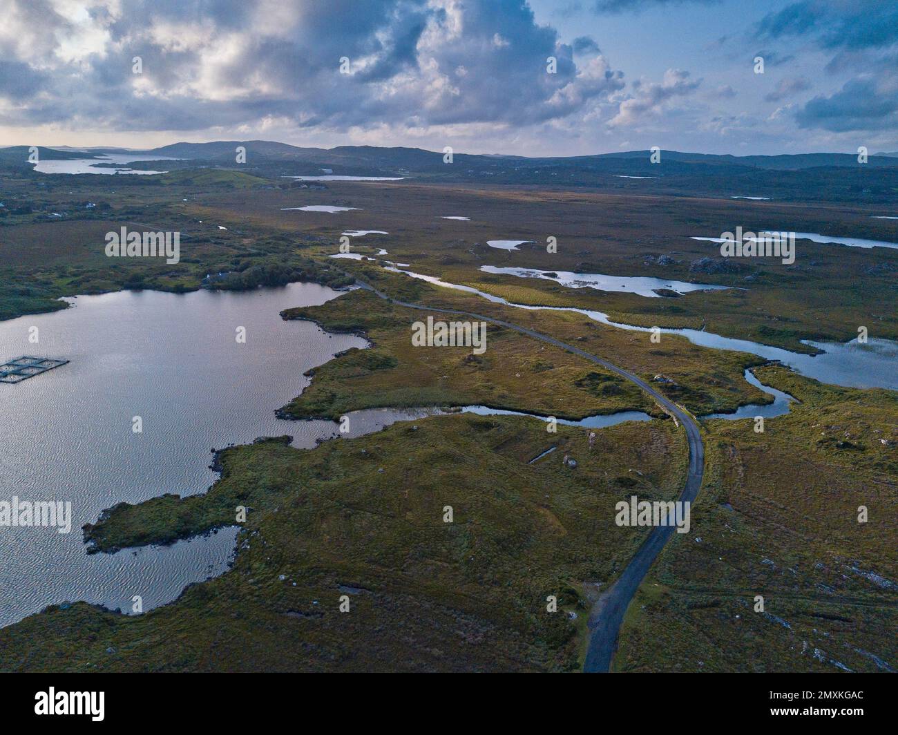 Aerial view, small road through lake and moorland landscape near ...