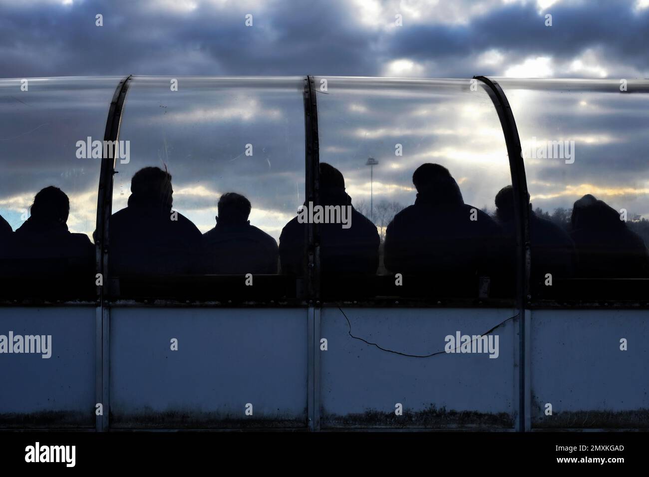 Symbol image substitute bench, people sitting against the light on a ...