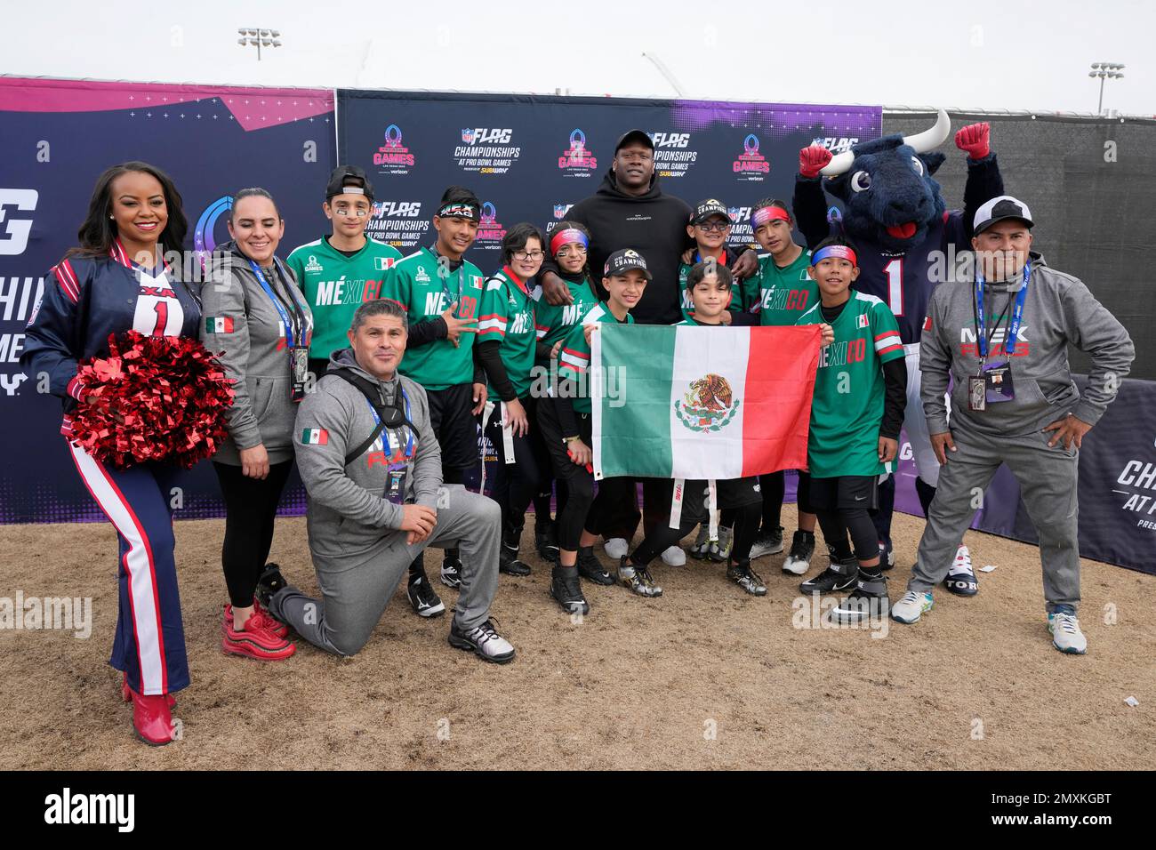 Houston Texans mascot Toro, a Houston Texans cheerleader, and AFC ...