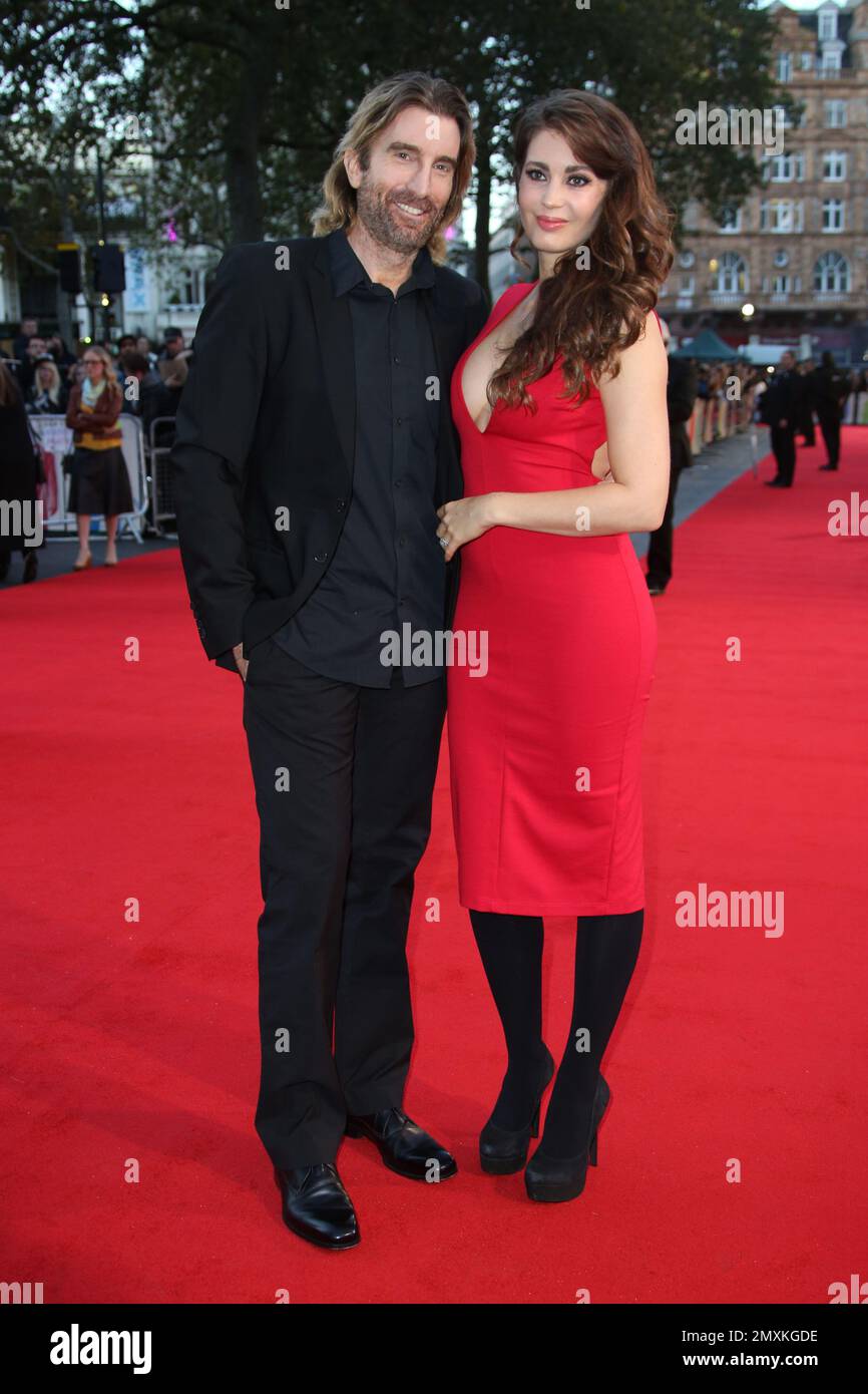 Actor Sharlto Copley poses for photographers upon arrival at the ...