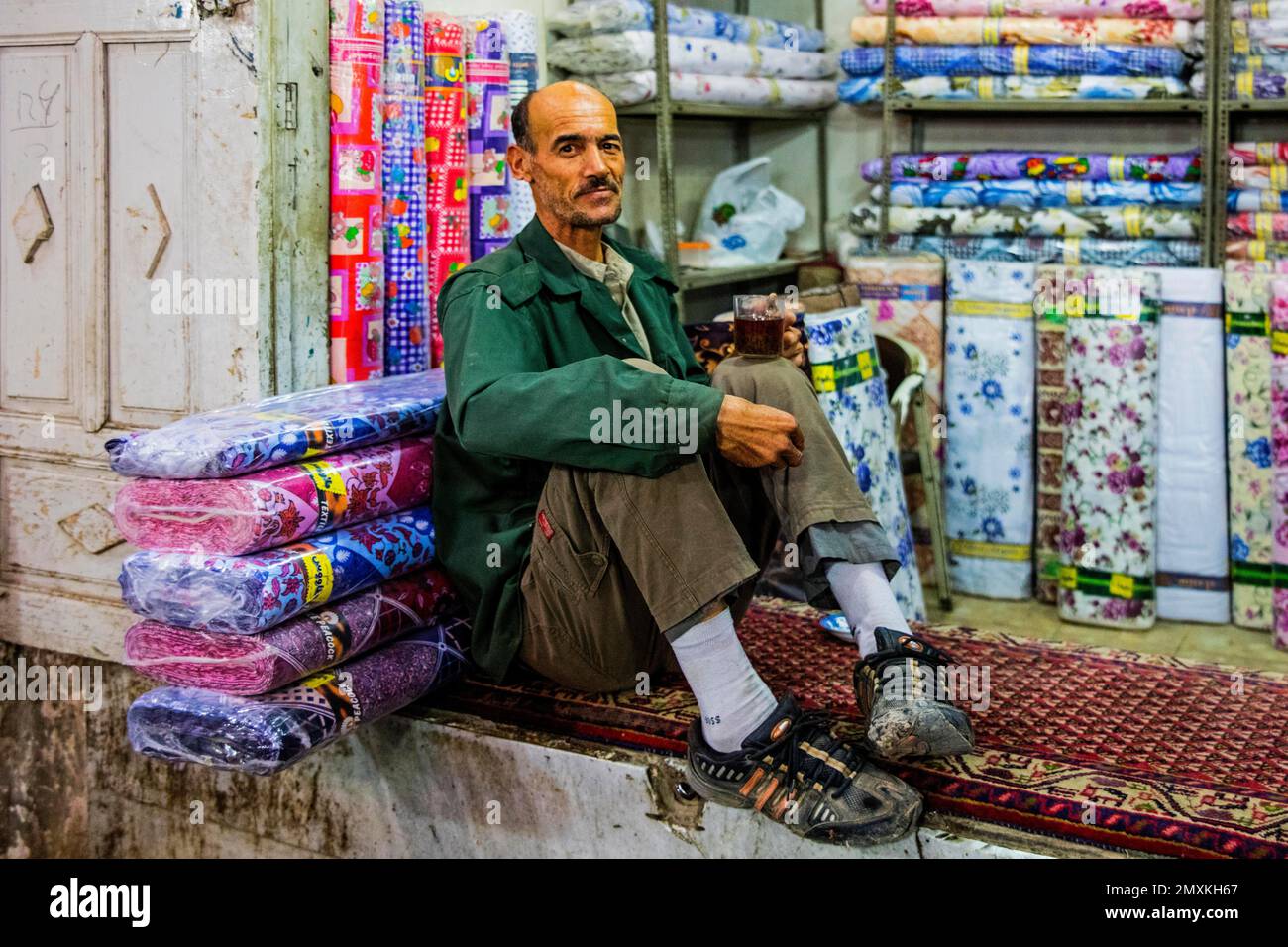 Colourful clothing shops, The Grand Bazaar, Isfahan, Isfahan, Iran ...