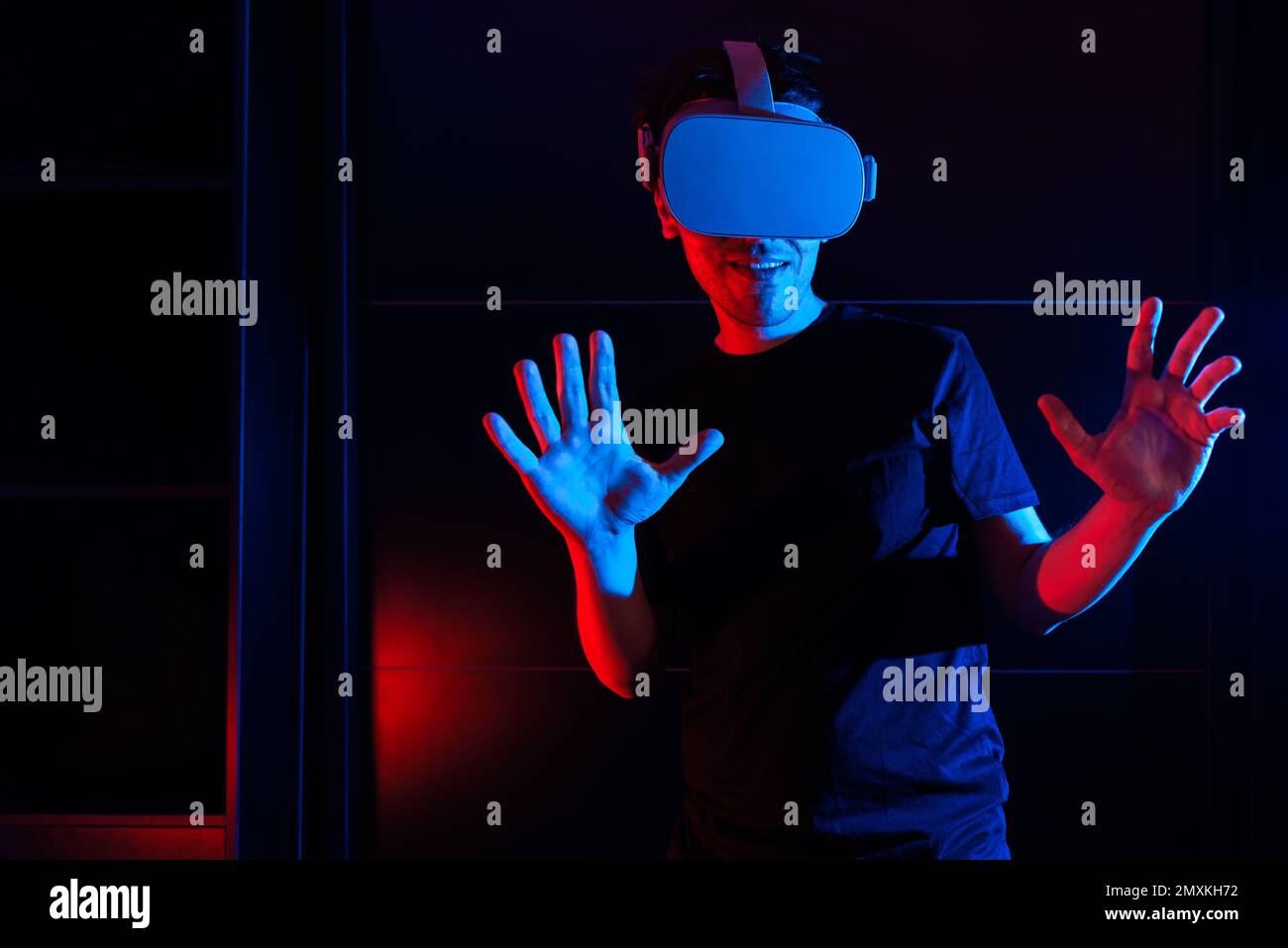 Gamer Man Wearing Virtual Reality Goggles Stock Photo - Alamy