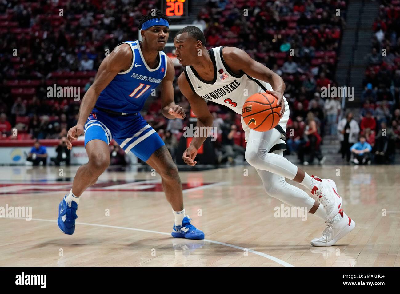 San Diego State guard Micah Parrish (3) drives with the ball as Boise ...