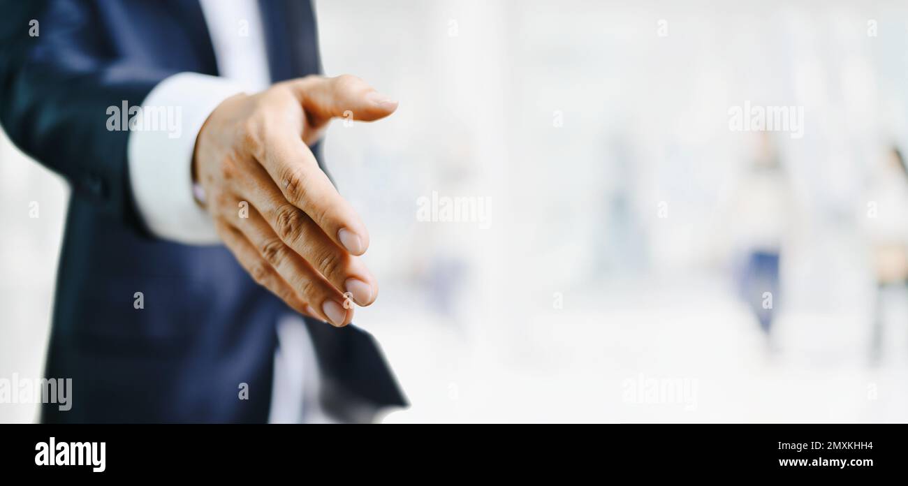 Business man open hand ready to seal a deal, partner shaking hands ...