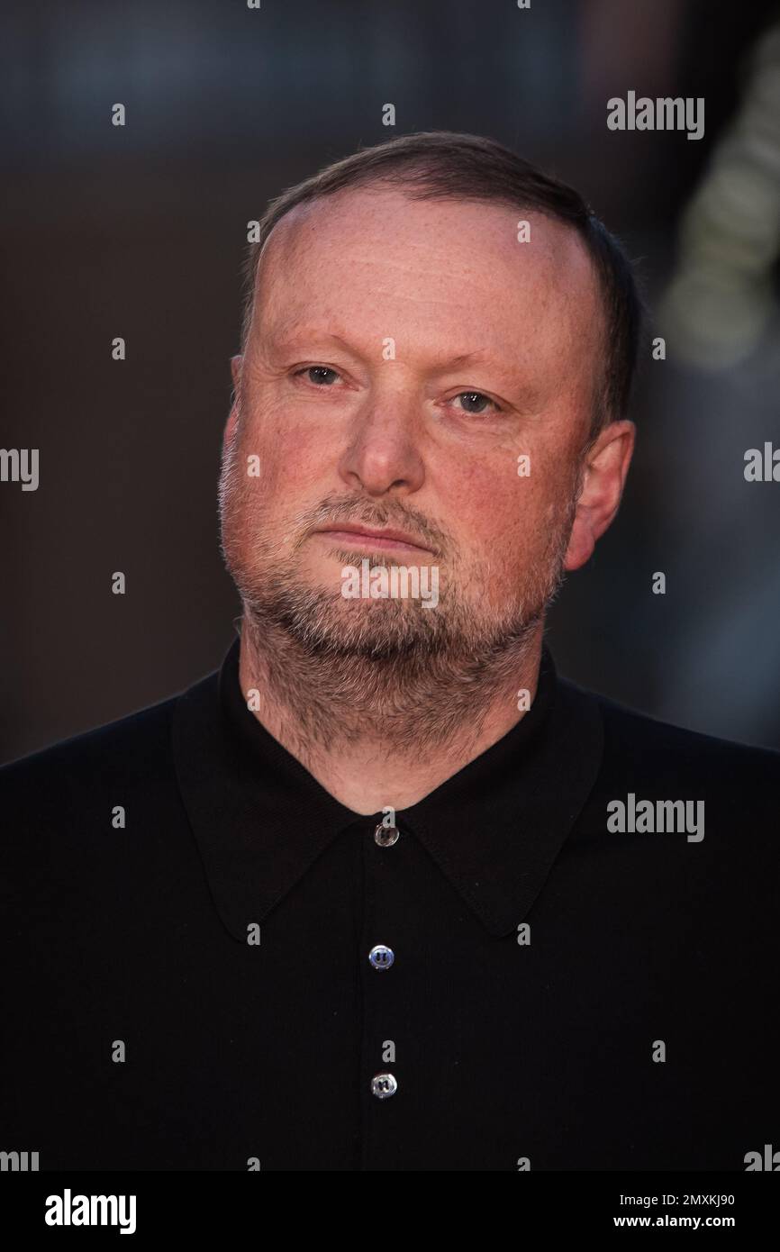 Andrew Starke poses for photographers upon arrival at the premiere of ...