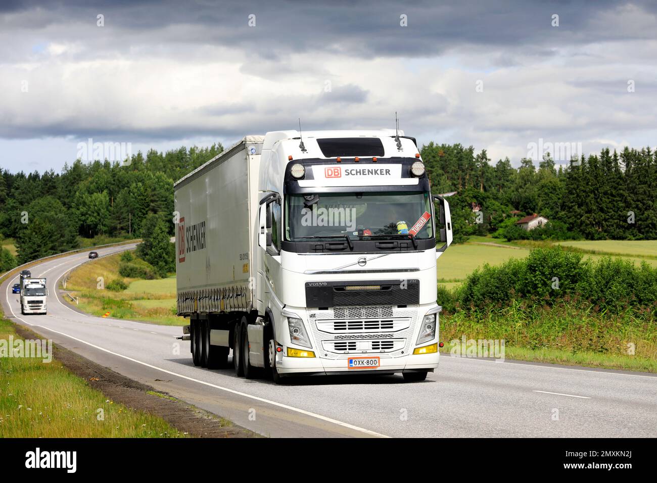 White Volvo FH truck transports DB Schenker semi trailer on highway 52 ...