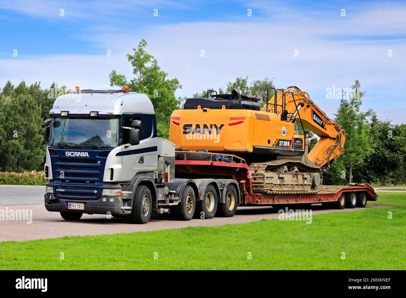 Scania R560 truck and SANY SY390H large excavator loaded on lowboy semi ...