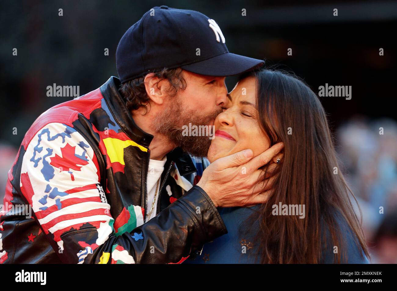 Italian Pop singer Lorenzo Cherubini ' Jovanotti ' kisses his wife ...