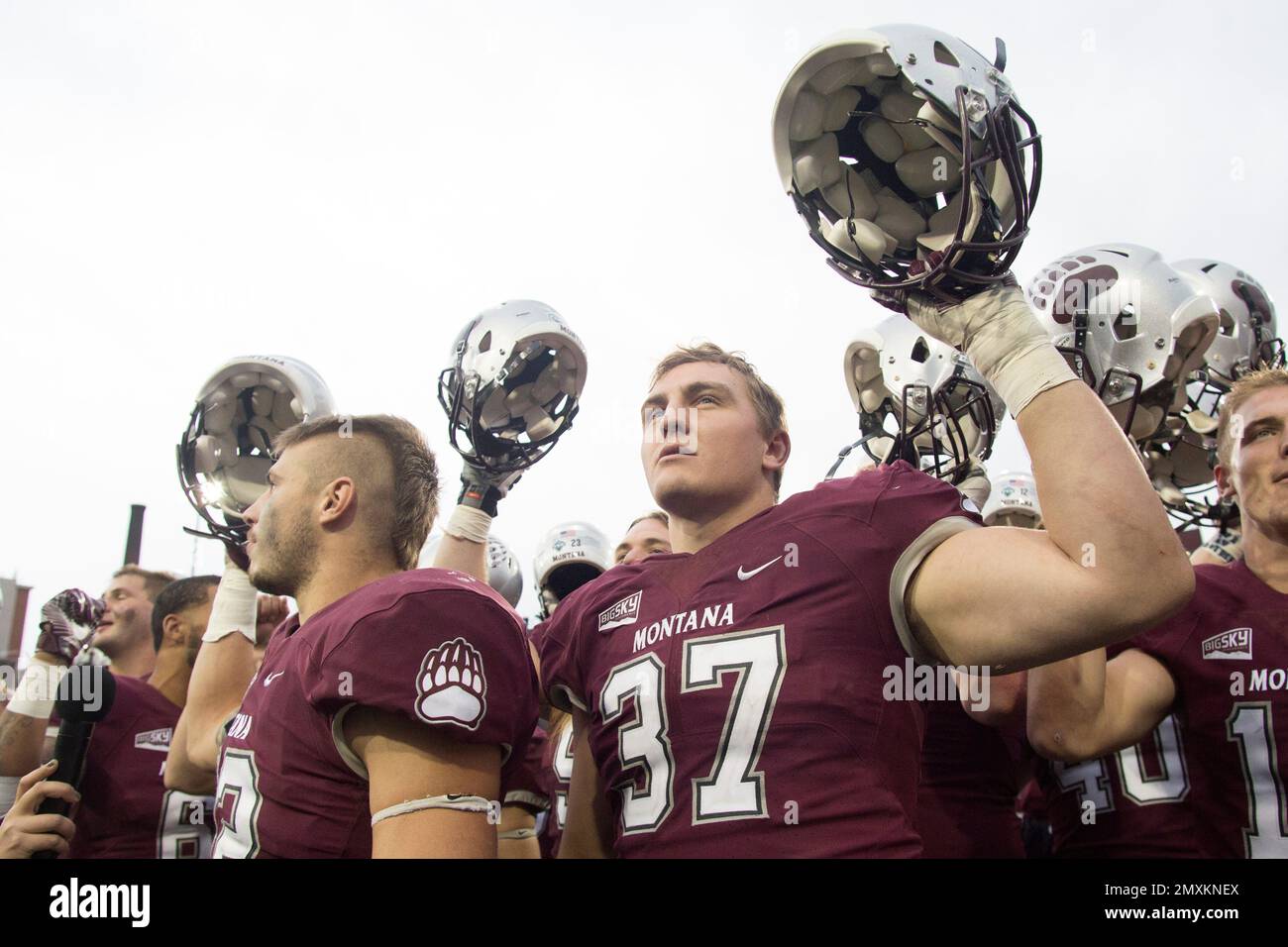 Montana defensive end Caleb Kidder (37) sings the school fight song ...