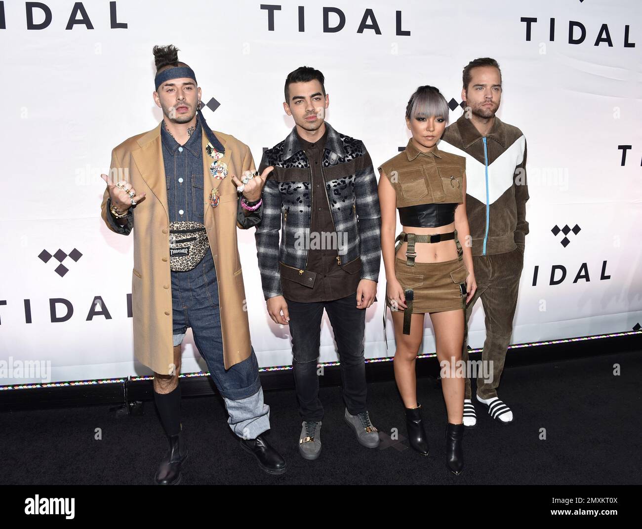Members of the band DNCE, from left, Cole Whittle, Joe Jonas, JinJoo ...
