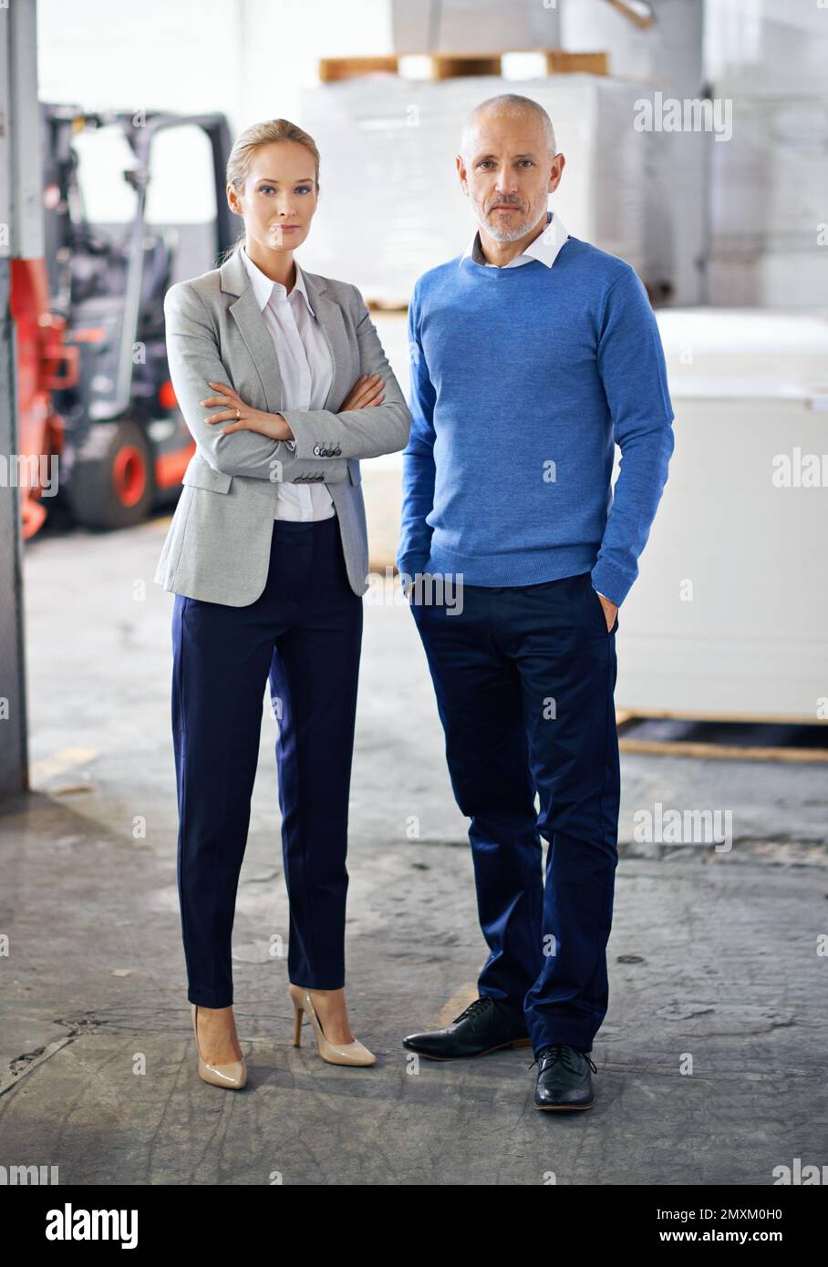 Great management making success attainable. Two managers on the factory ...