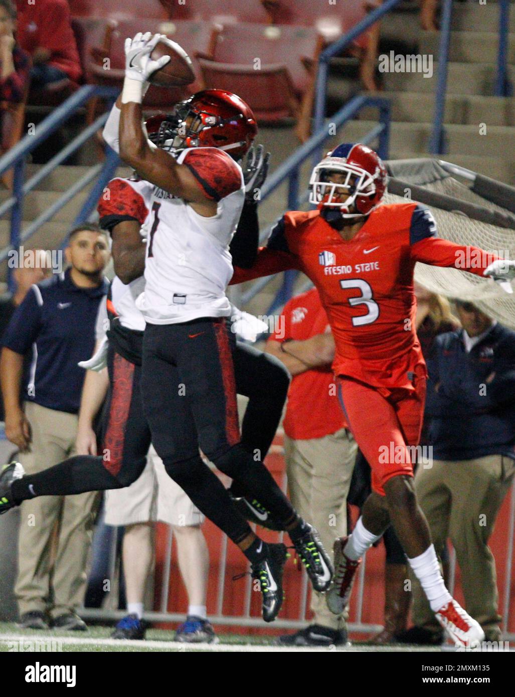 San Diego State's Kameron Kelly intercepts a pass over Fresno State's ...
