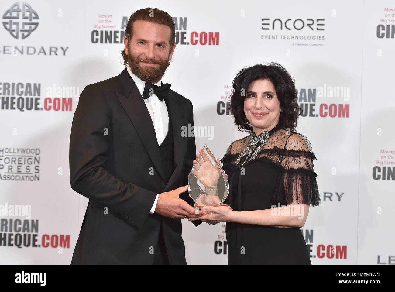 Bradley Cooper, left, and Sid Grauman award honoree Sue Kroll attend ...