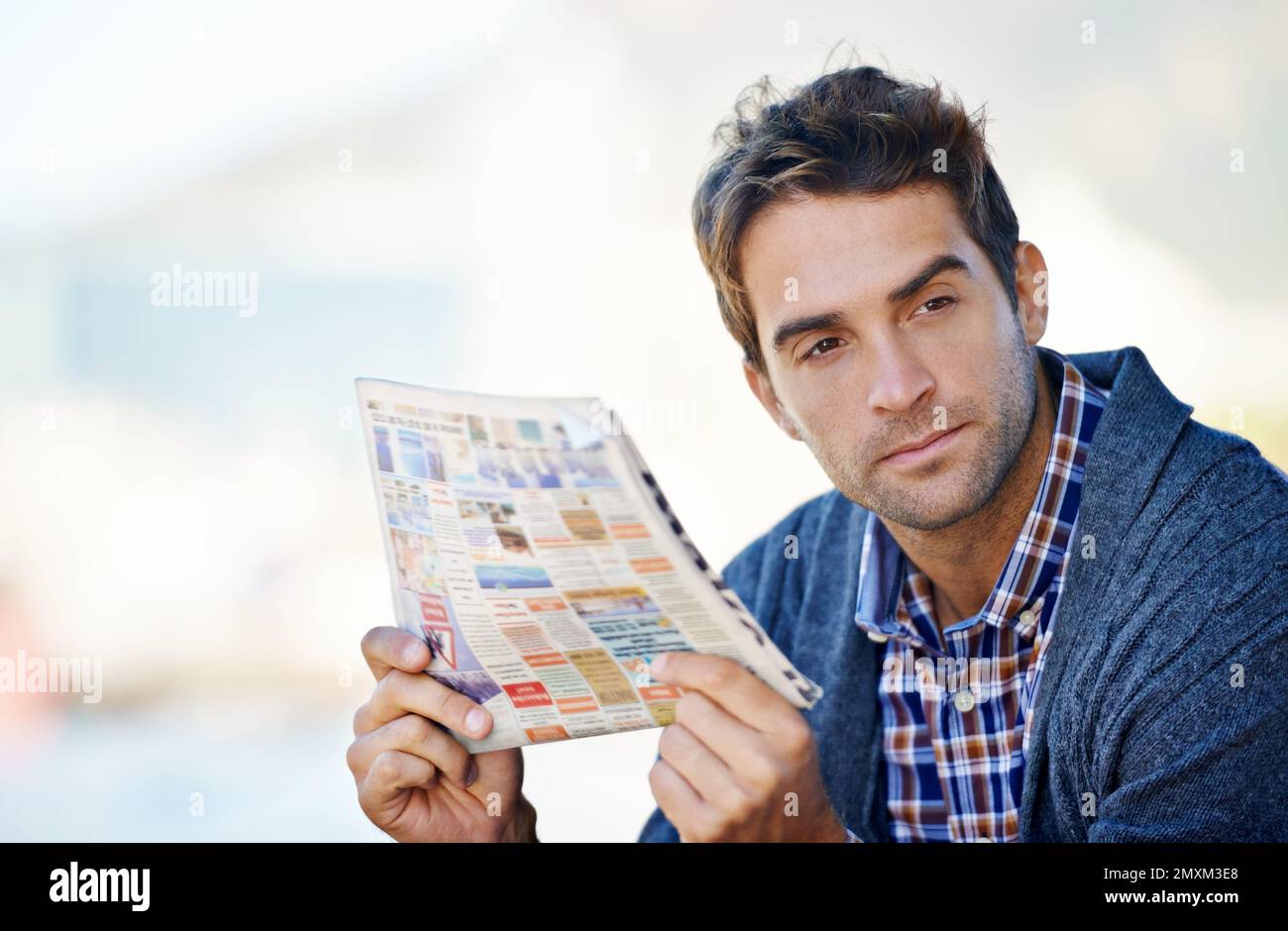 Thats something to think about. a man looking thoughtful while holding ...