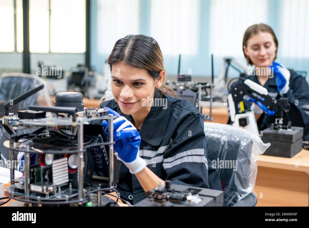 Engineer check and control welding robotics automatic arms machine in ...