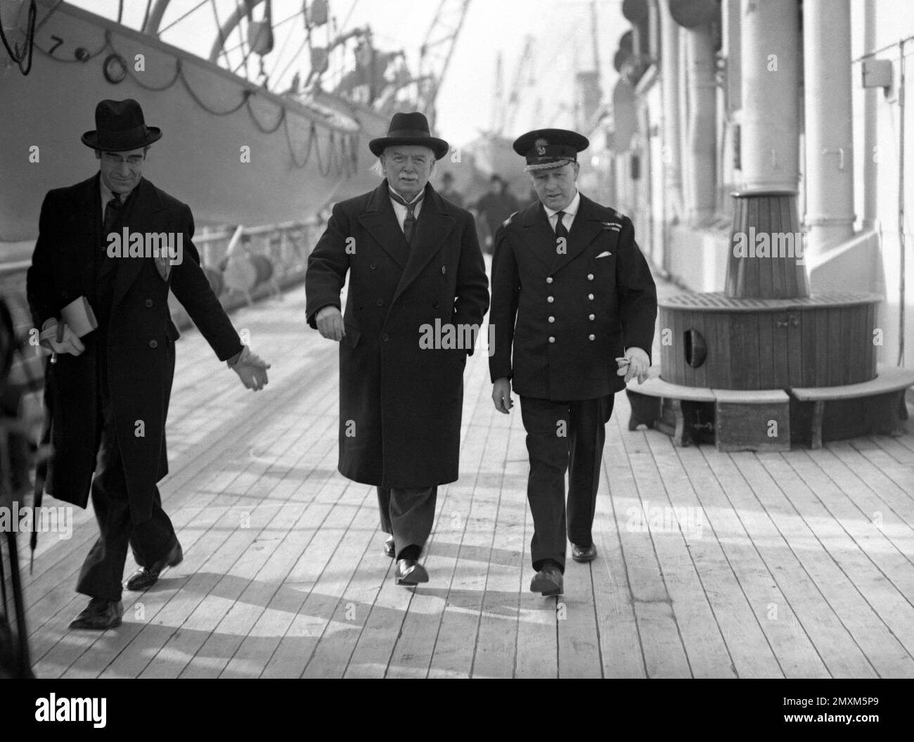 David Lloyd George, centre, walking on the deck of the liner Kaiser-I ...