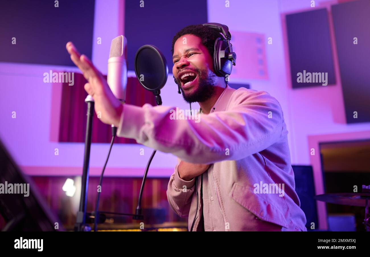 Rap musician singing in studio hi-res stock photography and images - Alamy