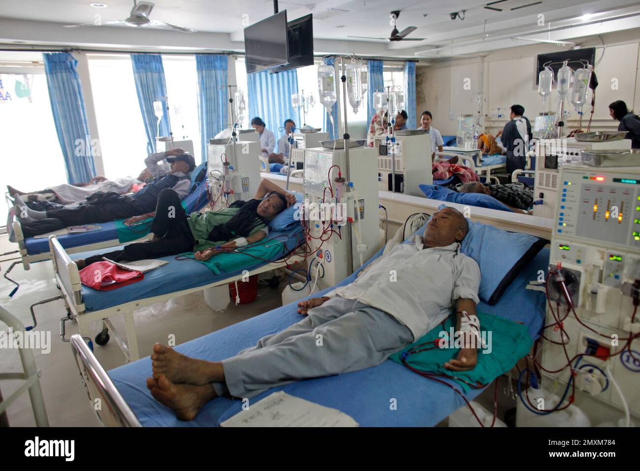In this Sept. 29, 2016 photo, Nepalese patients receive treatment at Aarogya Foundation, a ...