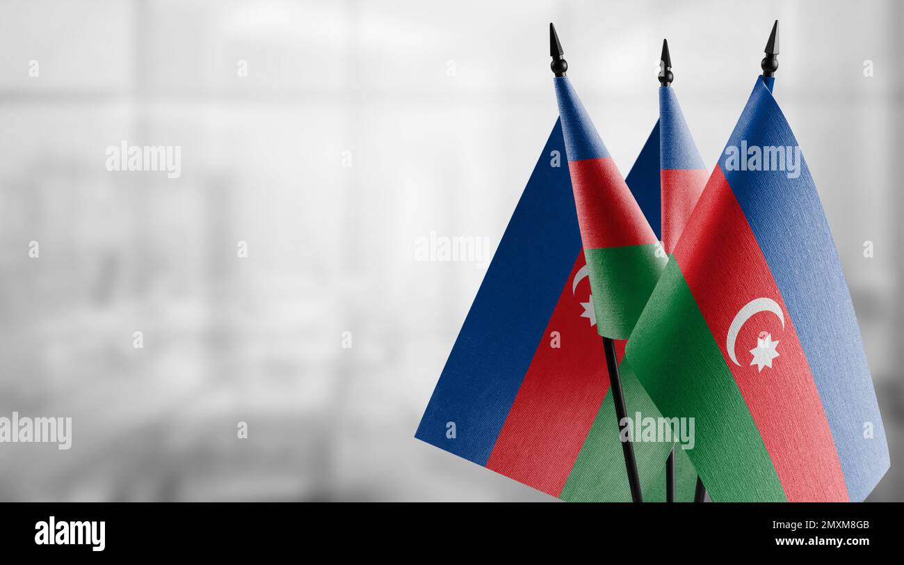 Small flags of the Azerbaijan on an abstract blurry background Stock ...