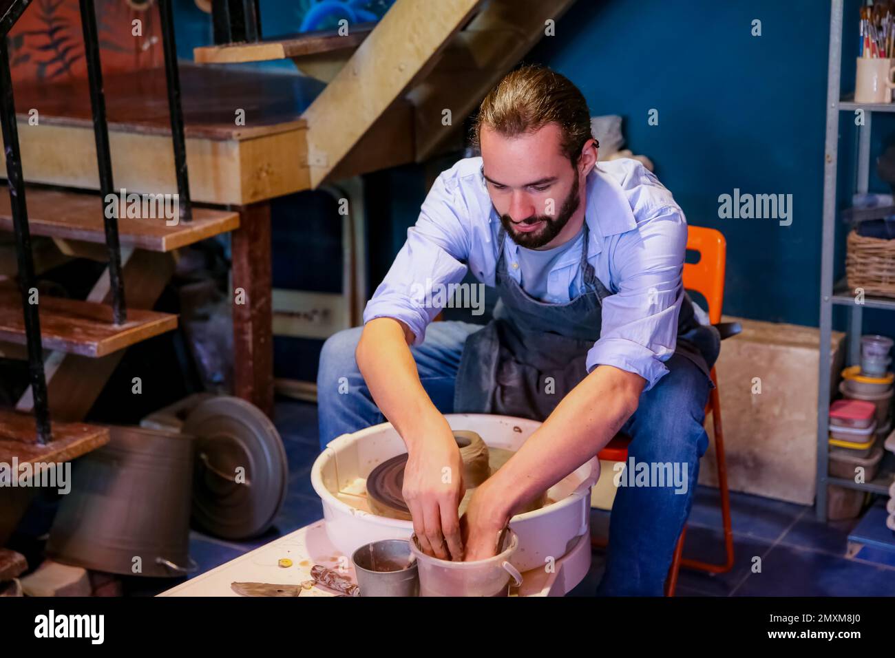 Small business owner, Young People Creating Pottery Stock Photo - Alamy