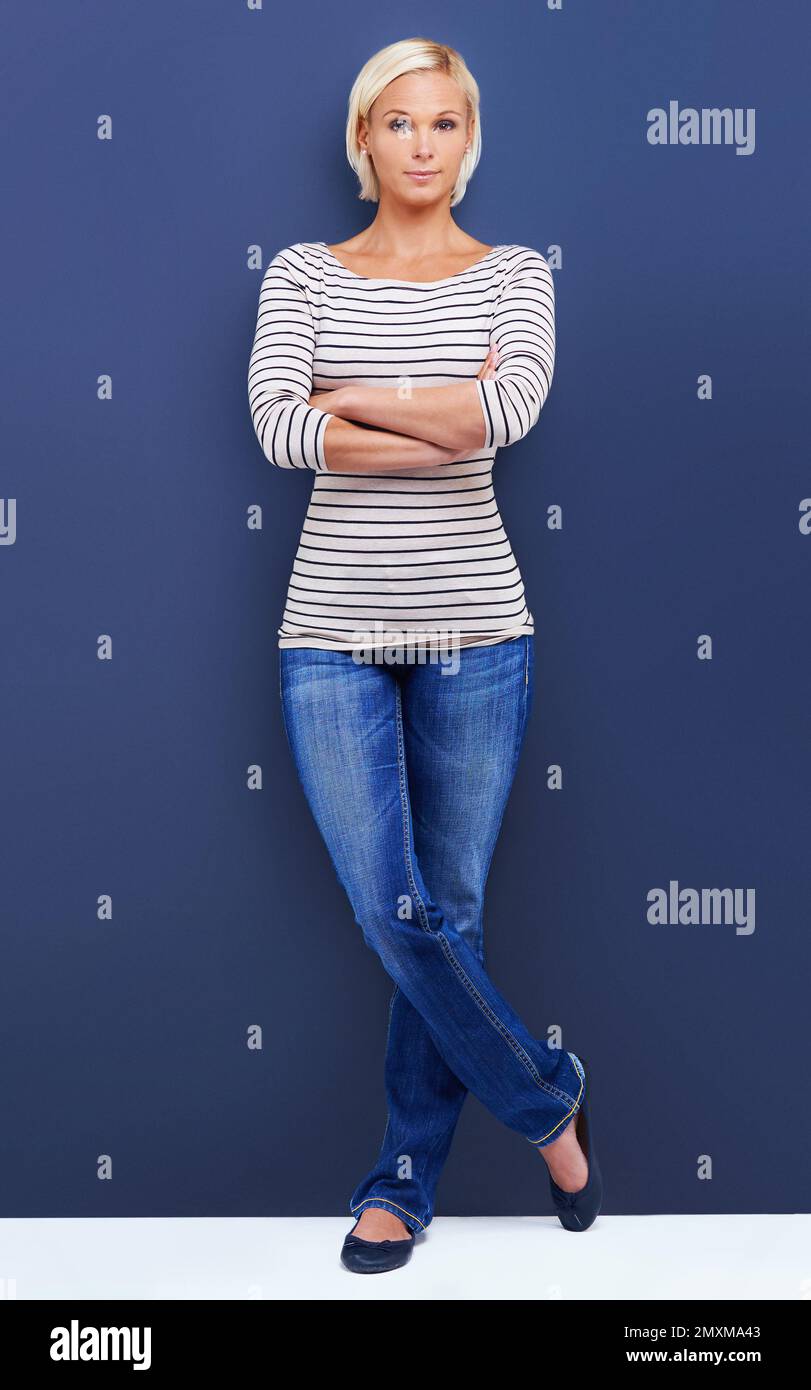 Miss Confidence. Full-length studio portrait of a beautiful young woman ...