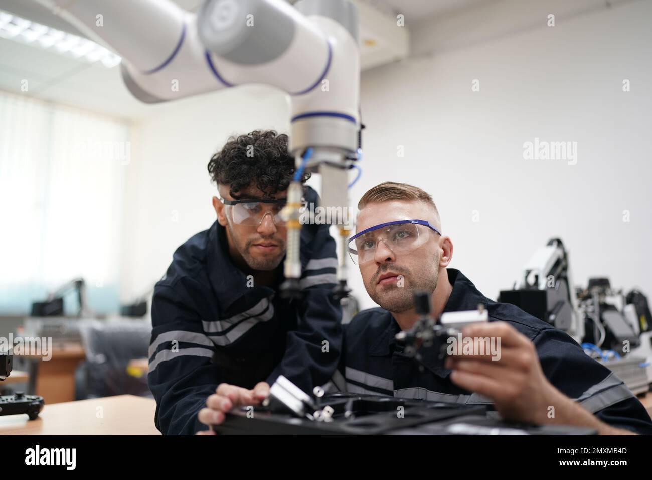 Engineers Maintenance Robot Arm at Lab in a High Tech Research ...