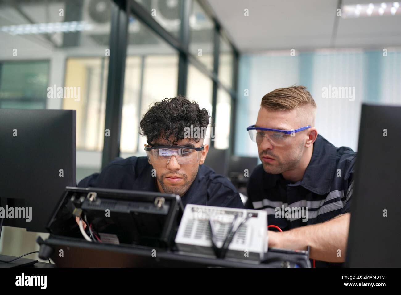 Engineers Maintenance Robot Arm at Lab in a High Tech Research ...