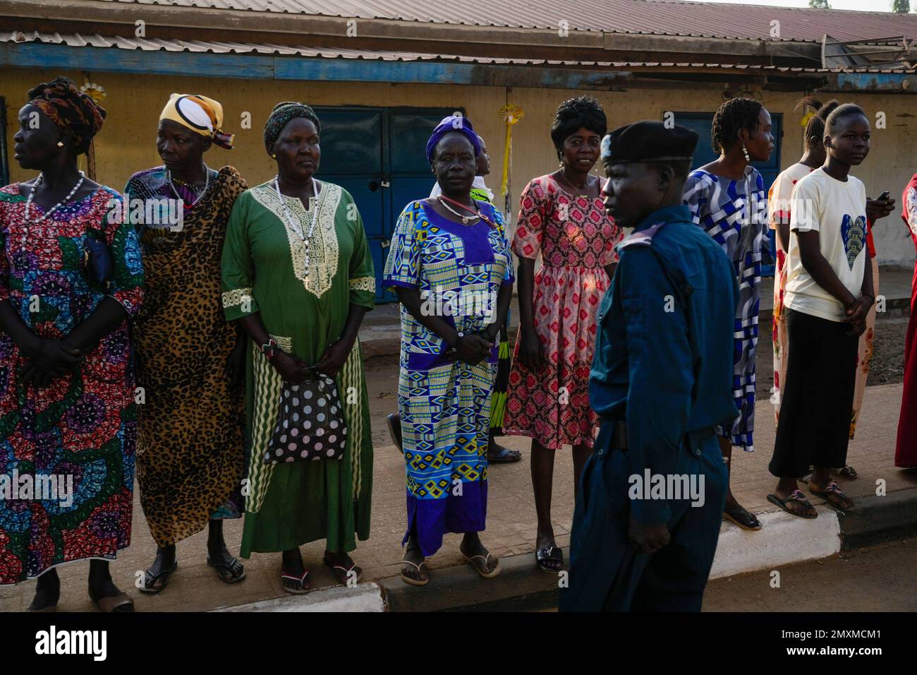 People stand in the streets in Juba, South Sudan, before Pope Francis ...