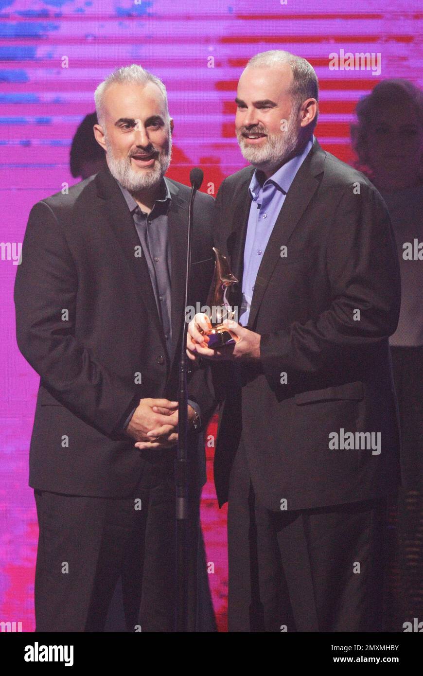 Alex Kendrick and Stephen Kendrick accept an award for their movie War Room at the 47th Annual ...