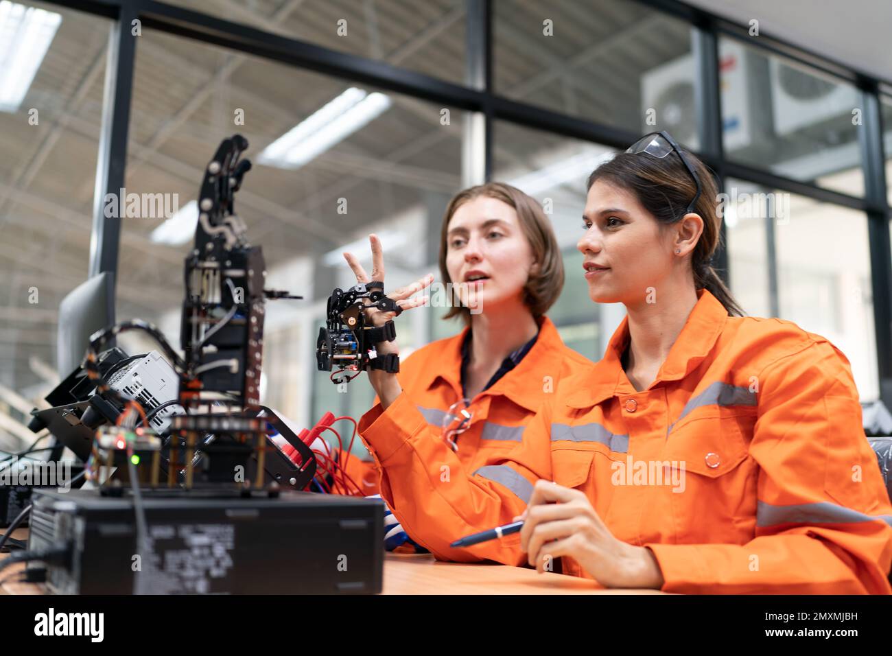 Engineer check and control welding robotics automatic arms machine in ...