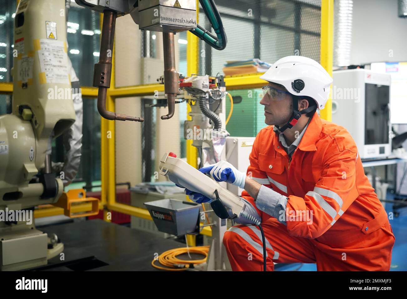 Engineers Maintenance Robot Arm at Lab in a High Tech Research ...