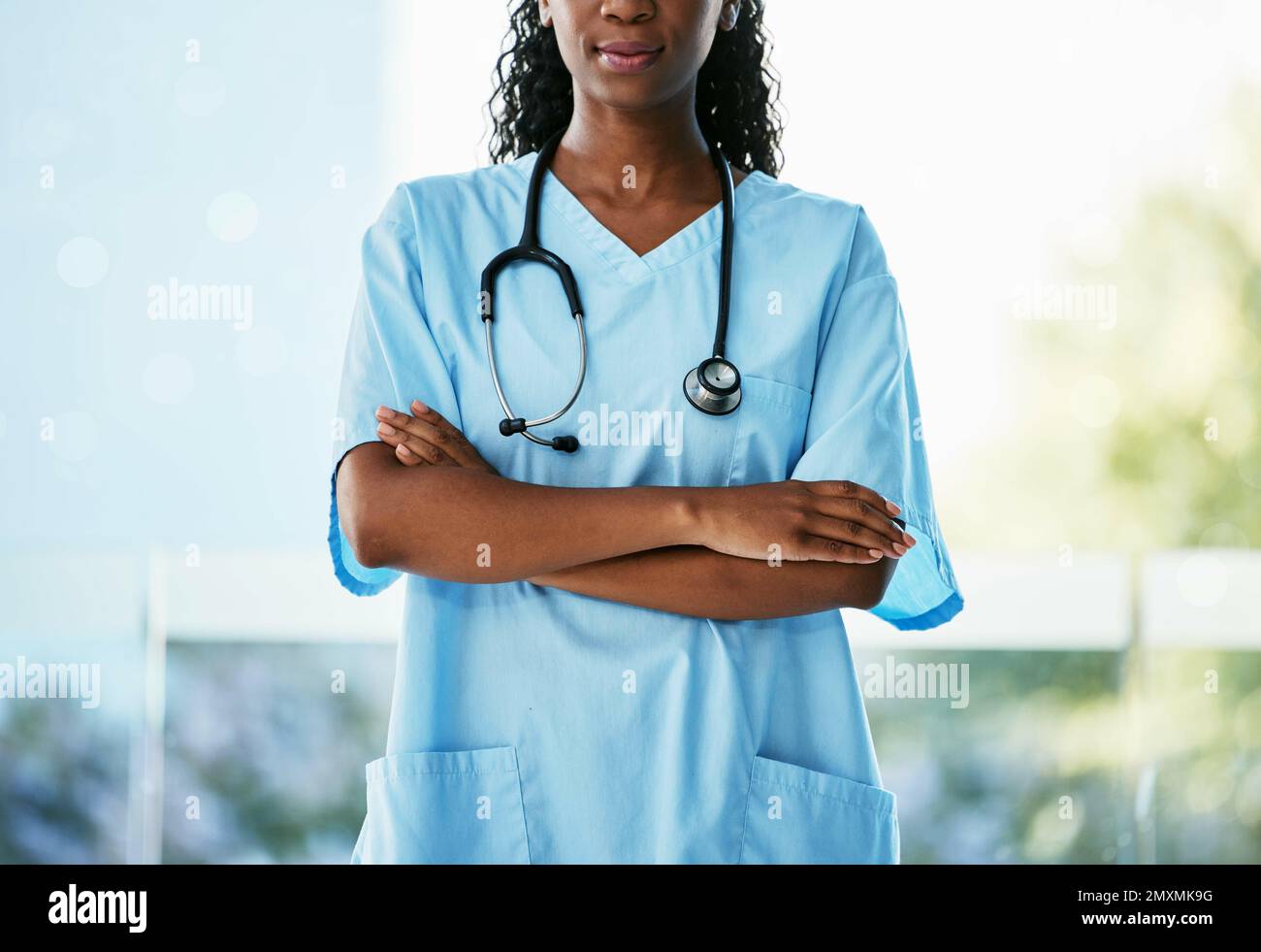 Healthcare, leadership and African doctor with crossed arms and ...