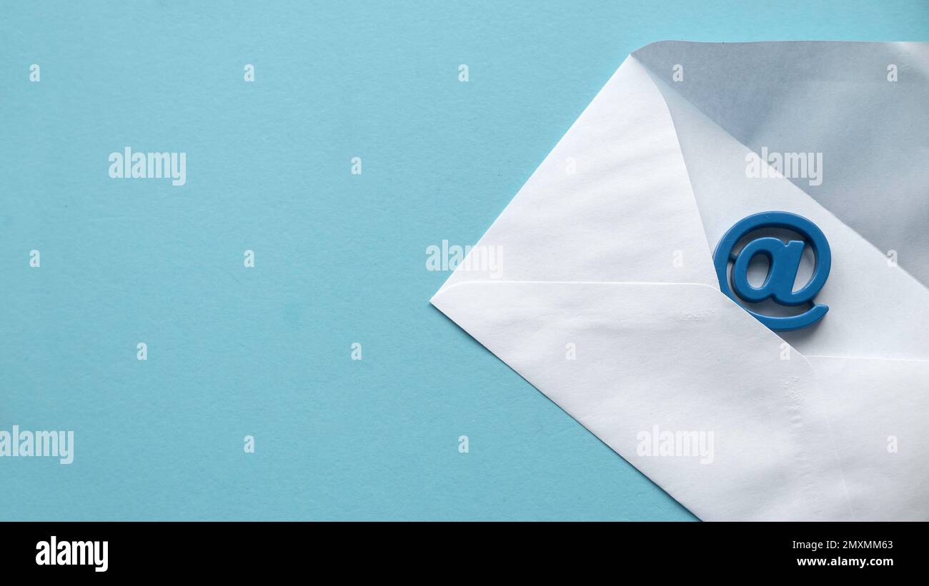 Email marketing concept. An open white envelope and email address ...