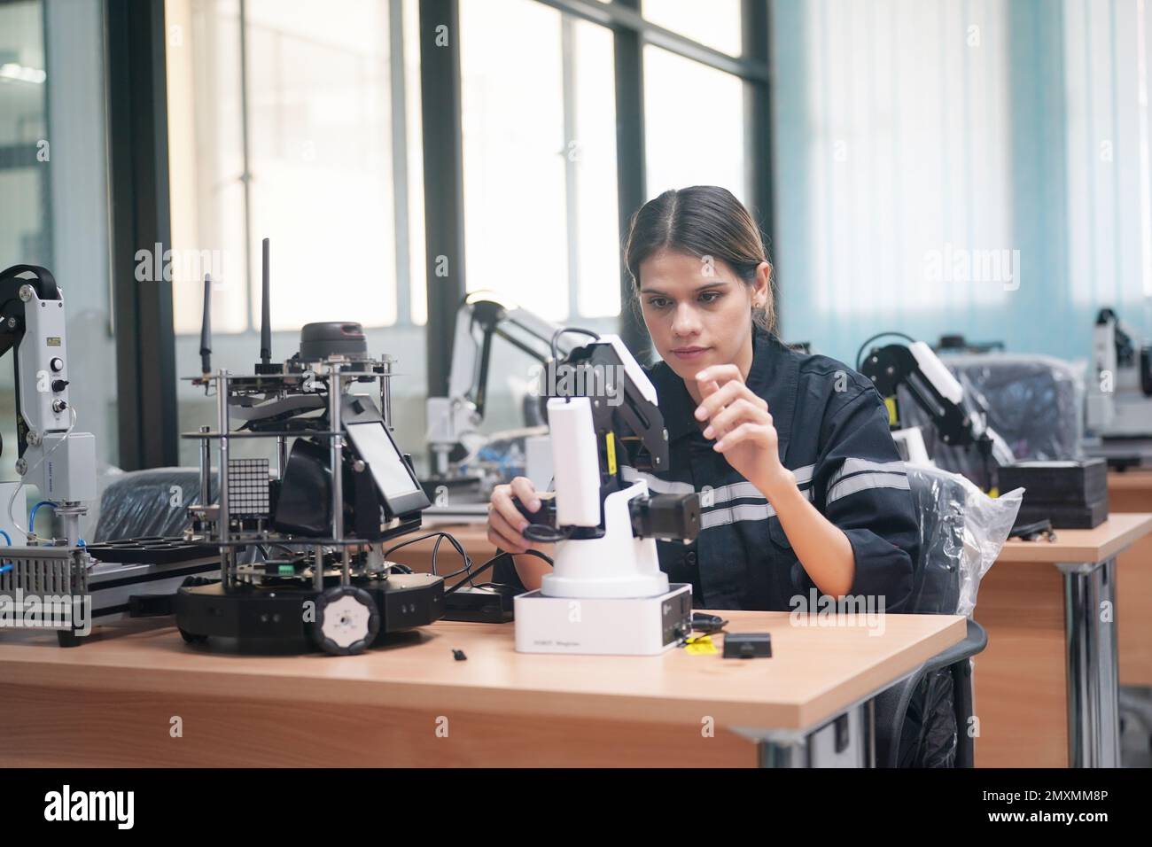 Engineers Maintenance Robot Arm at Lab in a High Tech Research ...