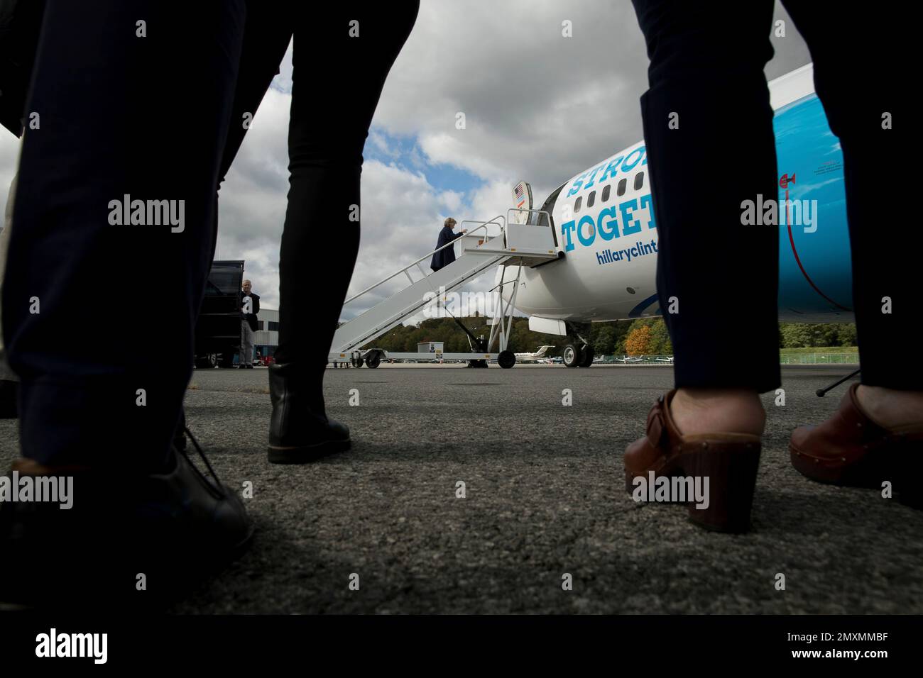 Members of the media watch as Democratic presidential candidate Hillary ...
