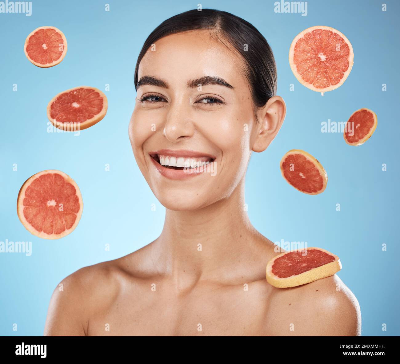 Woman, studio portrait and grapefruit with beauty skincare, smile or ...