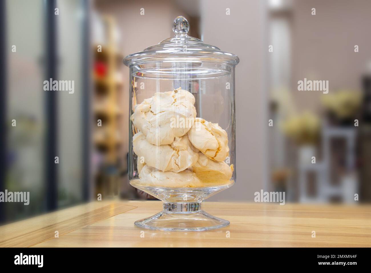 meringues in a glass jar in a pastry shop Stock Photo - Alamy