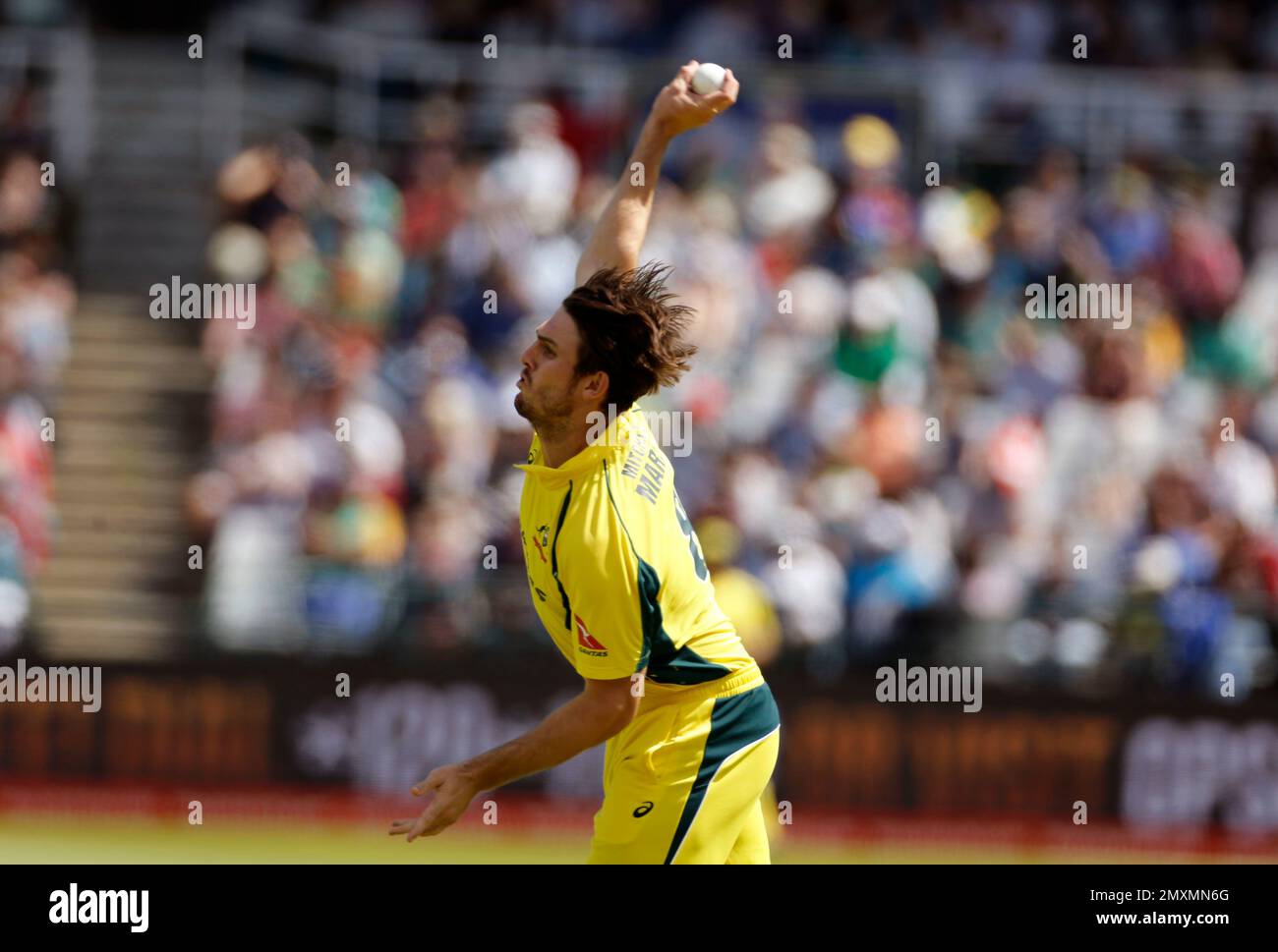 Australia’s Joe Mennie, warms up before bowling, during the 5th One Day ...
