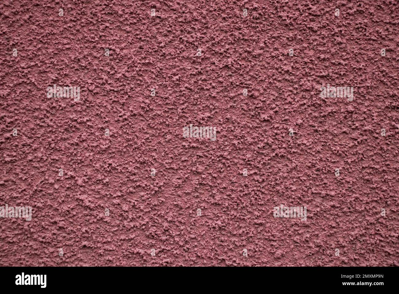 dusty pink house wall closeup as background Stock Photo - Alamy