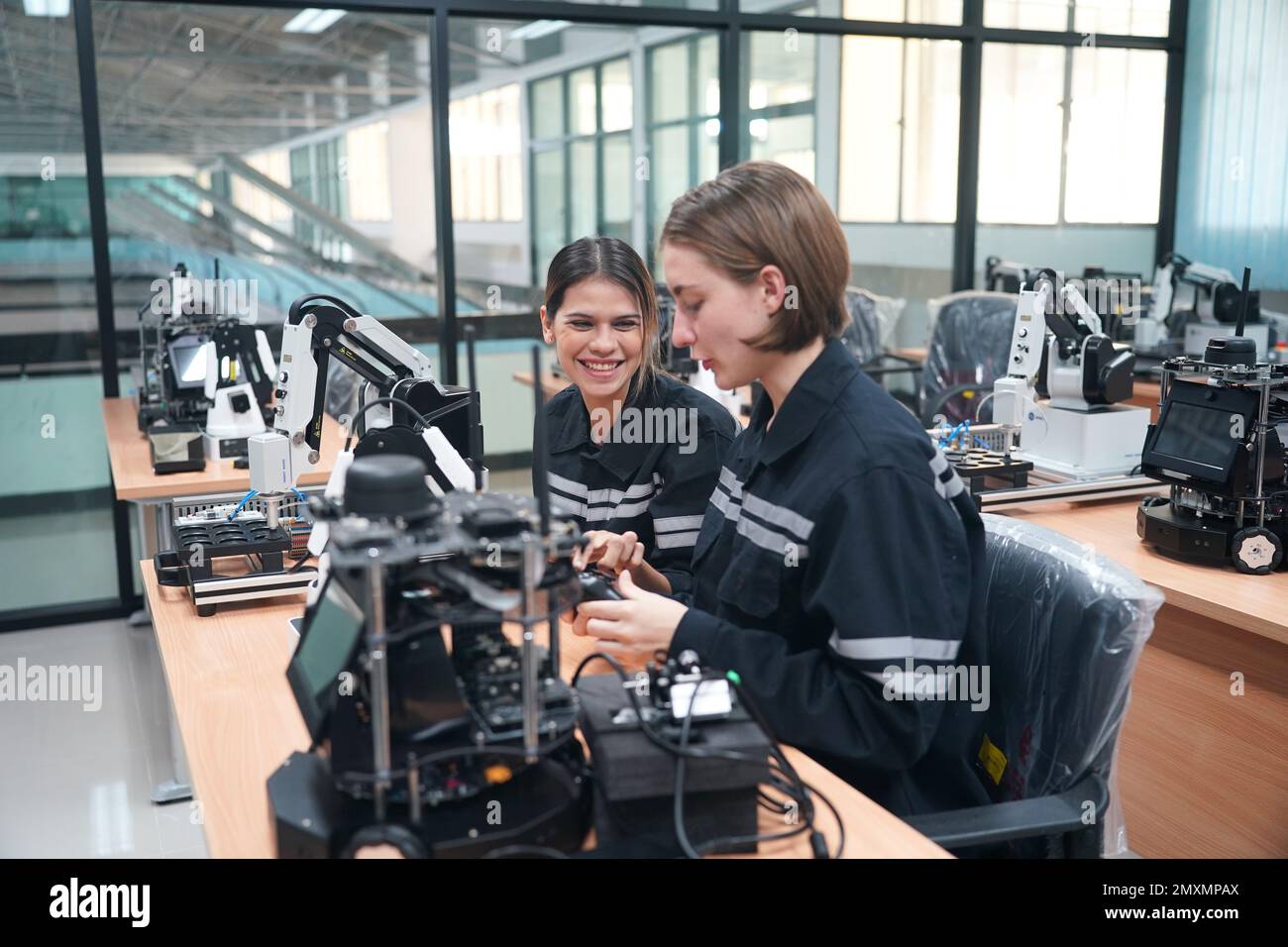 Engineers Maintenance Robot Arm at Lab in a High Tech Research ...