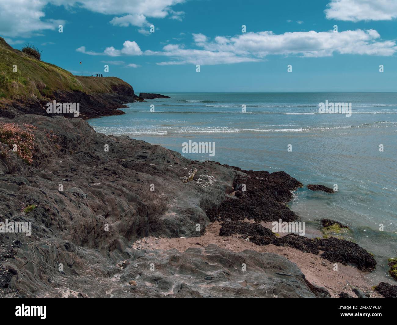 Cape of the Virgin Mary on a sunny day. The rocky Irish coast, rock ...