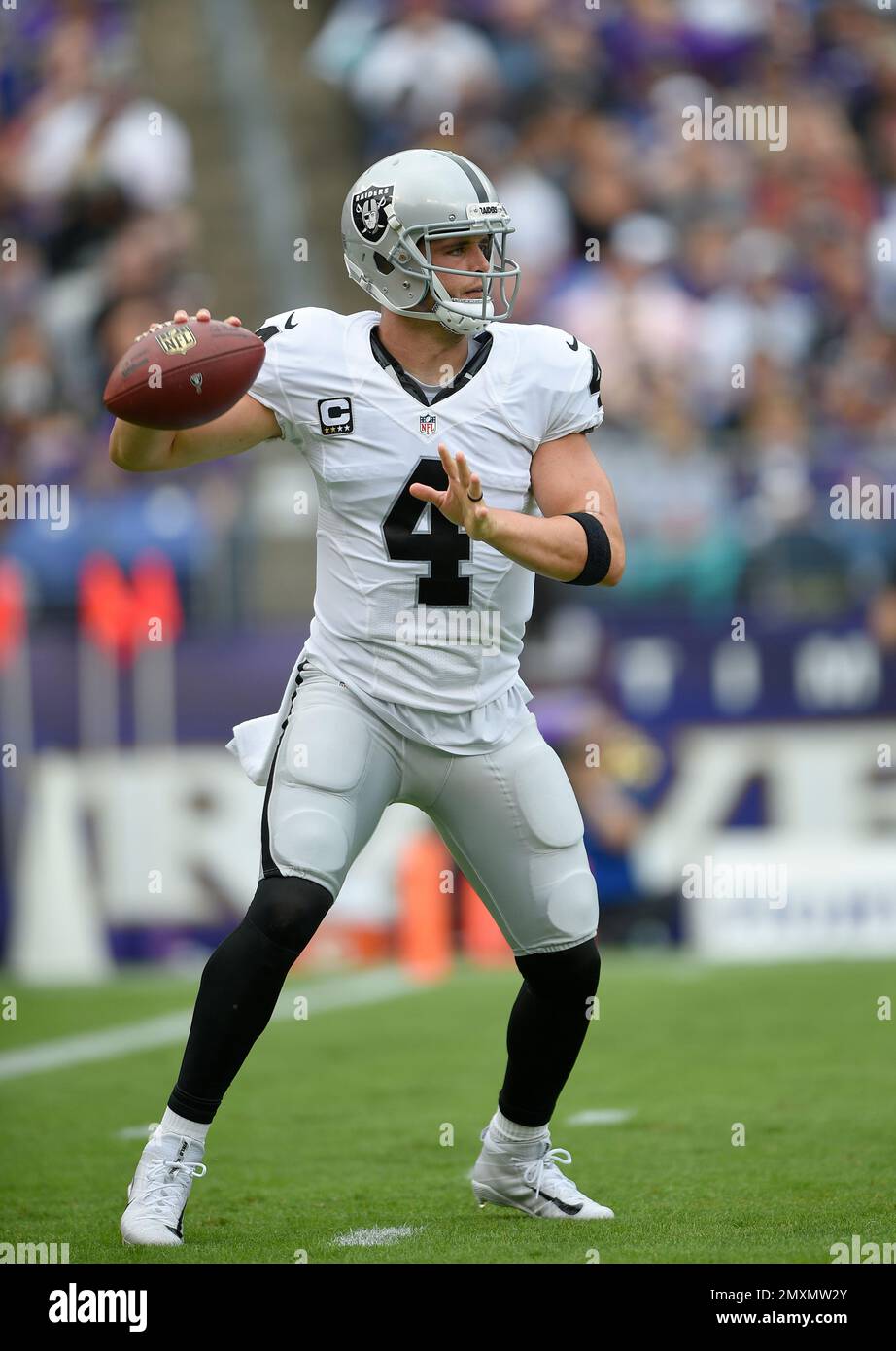 Oakland Raiders quarterback Derek Carr (4) looks to pass in the first ...